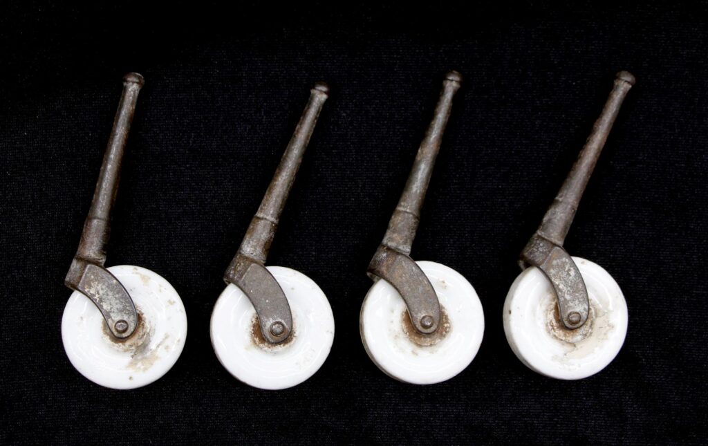 Set of Antique Porcelain 1.875 in. Steel Peg Caster Wheels | Olde Good ...